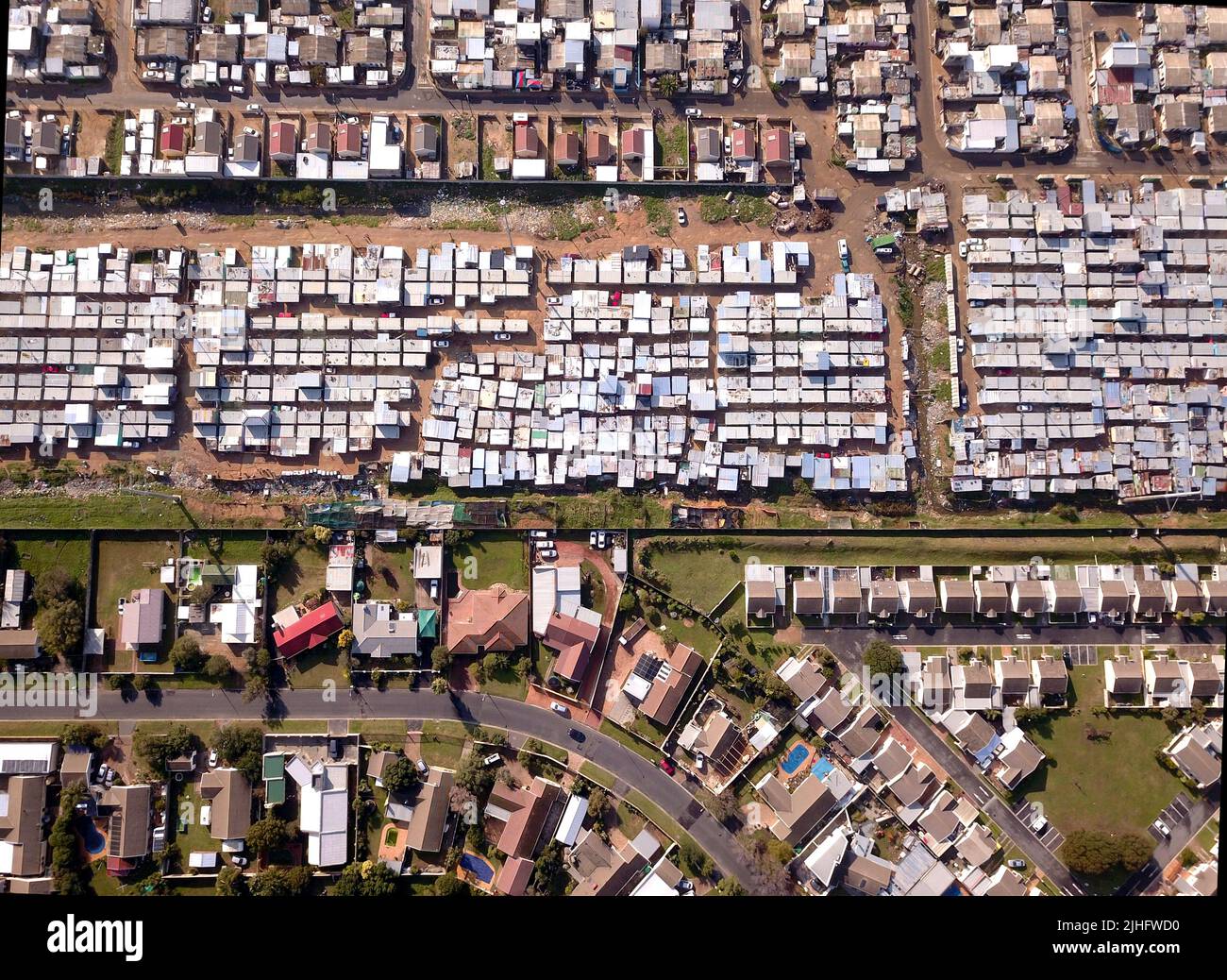 Aerial overhead township and wealthy suburb in South Africa Stock Photo ...