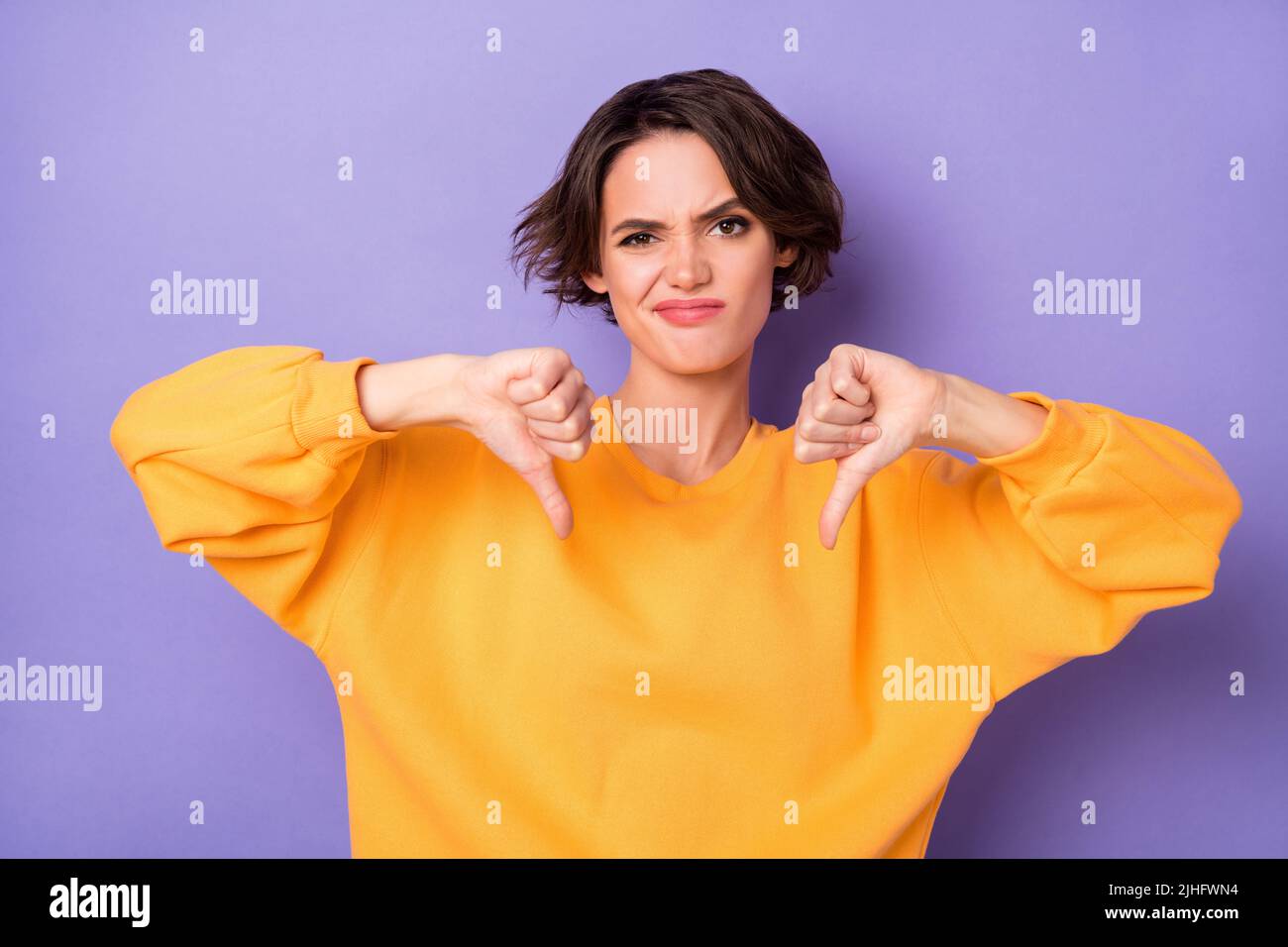 Photo of unsatisfied lady hands fingers demonstrate thumbs down ...