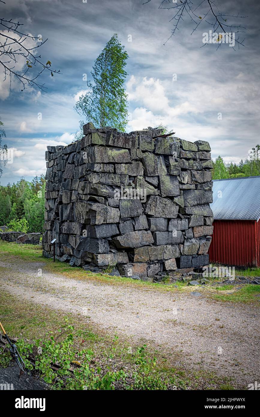 A rectangular stone monument at the Black Mountains outdoor museum at ...