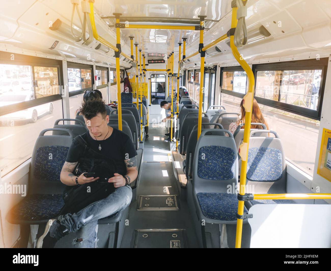 Kazan, Russia. 2022, 10 July. The interior of a trolley bus. Passengers ...