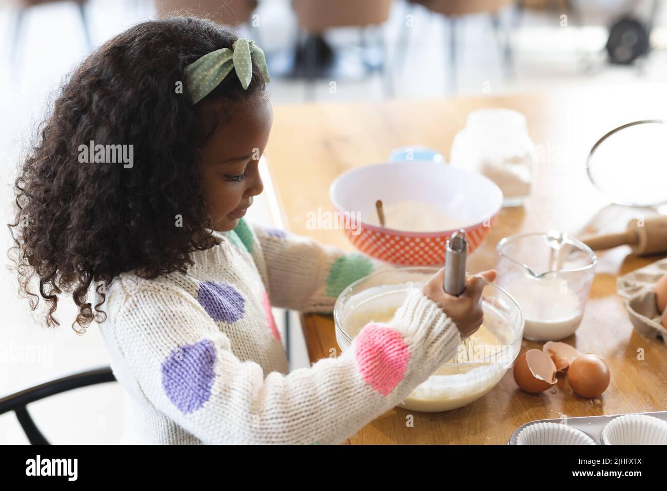 Image of african american girl baking in kitchen Stock Photo - Alamy
