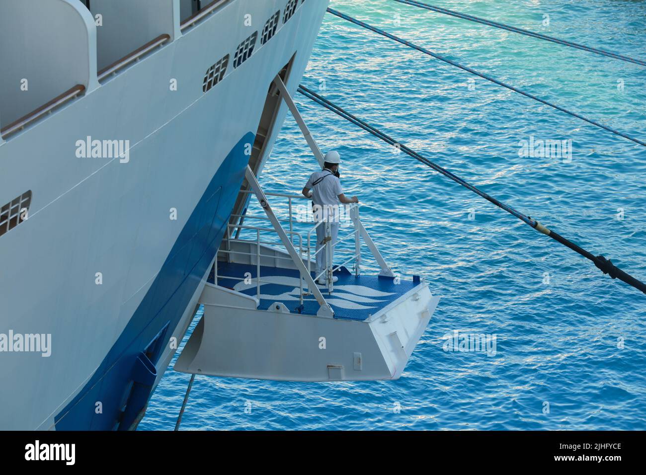 Ship's officer standing on the mooring platform to oversee the safety ...