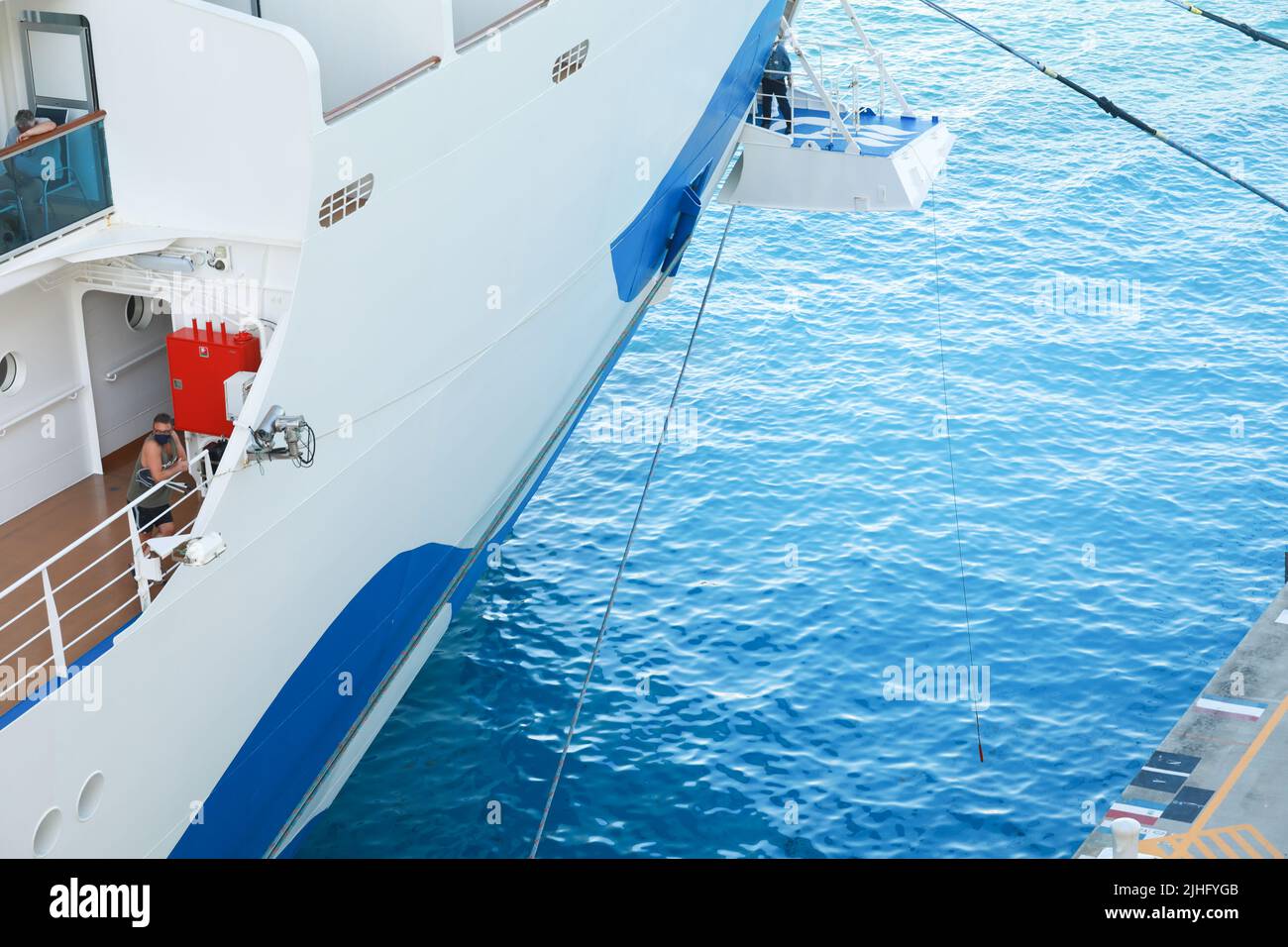 Ship's officer standing on the mooring platform to oversee the safety ...