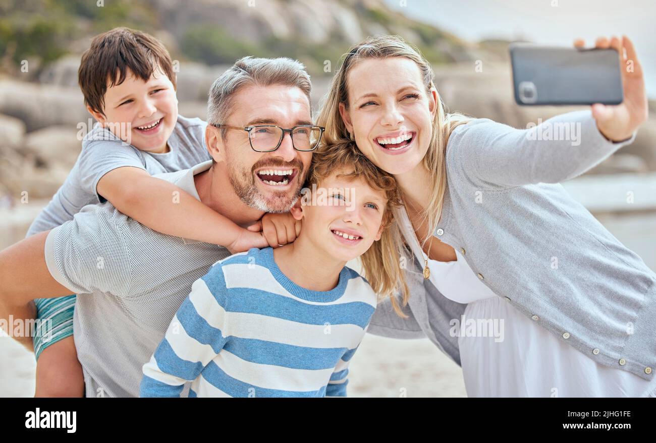 Parents taking photos of child playing hi-res stock photography and ...