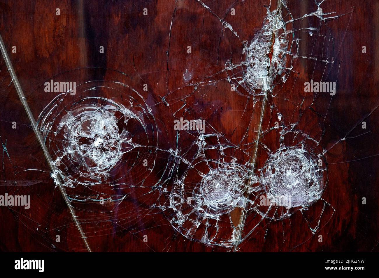 Smashed glass in a window destruction broken Stock Photo - Alamy