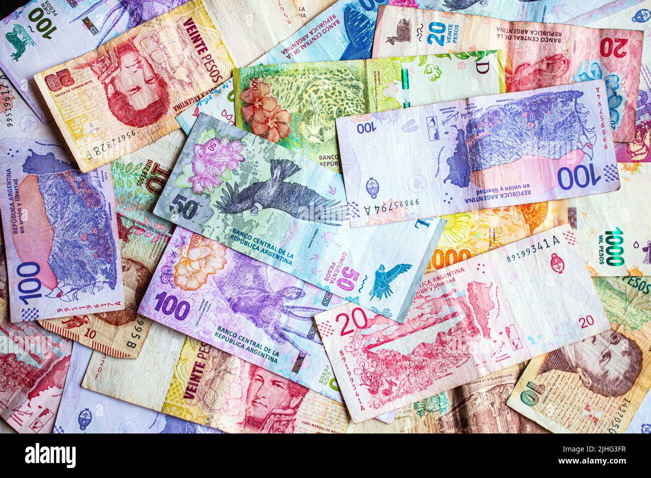 Argentine pesos of different values. Money from Argentina in cash Stock ...