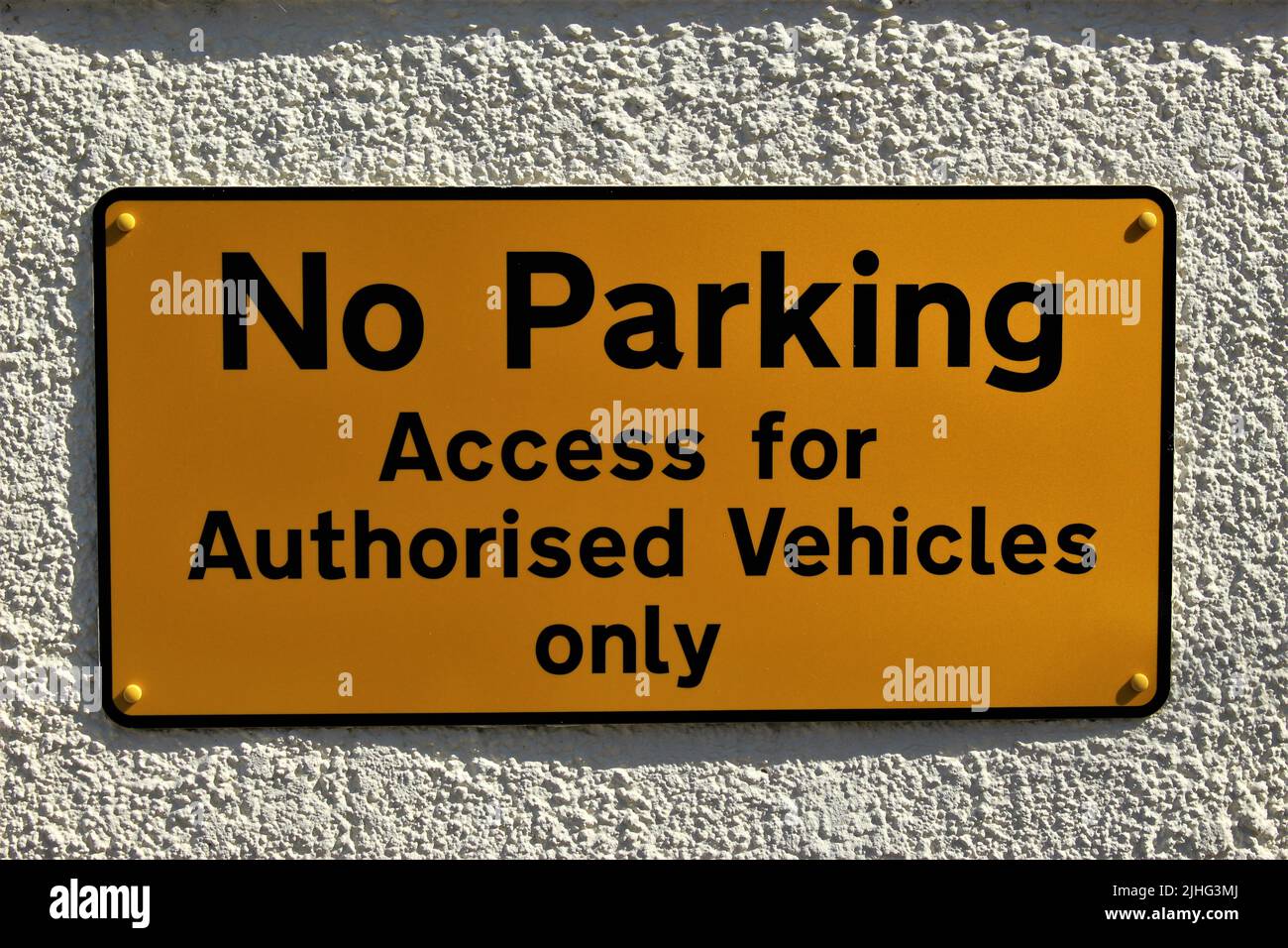 Yellow no parking sign with black letters. No Parking sign - yellow ...