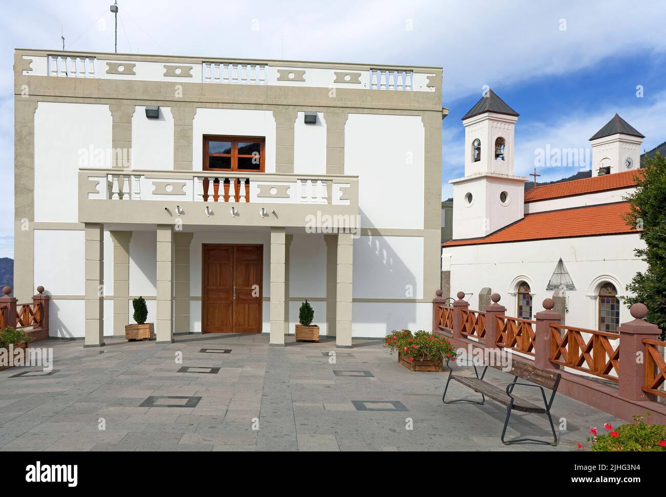 Town hall and church Nuestra Senora del Socorro in the mountain village ...