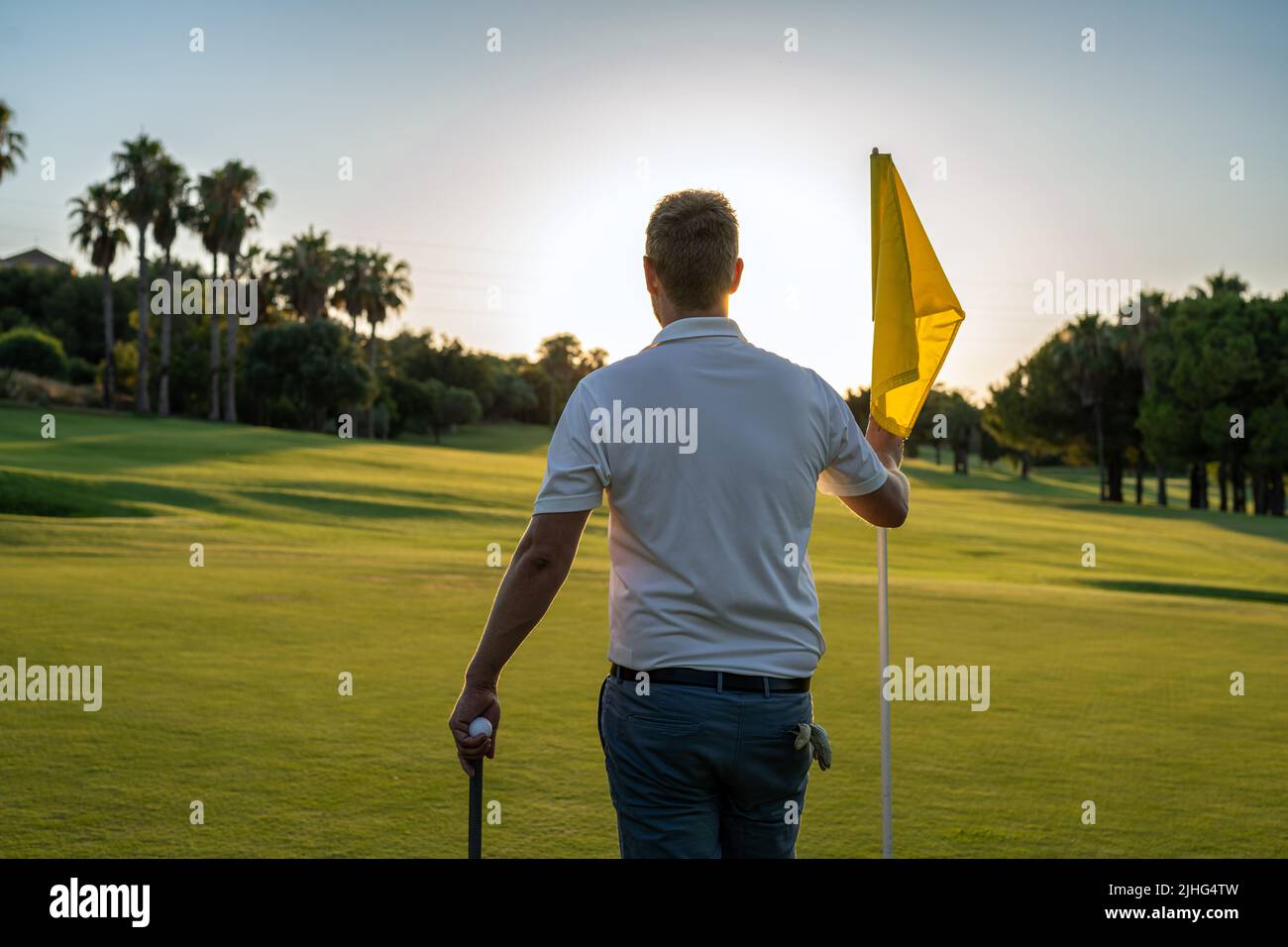 Back view of a professional golf player at golf club Stock Photo - Alamy