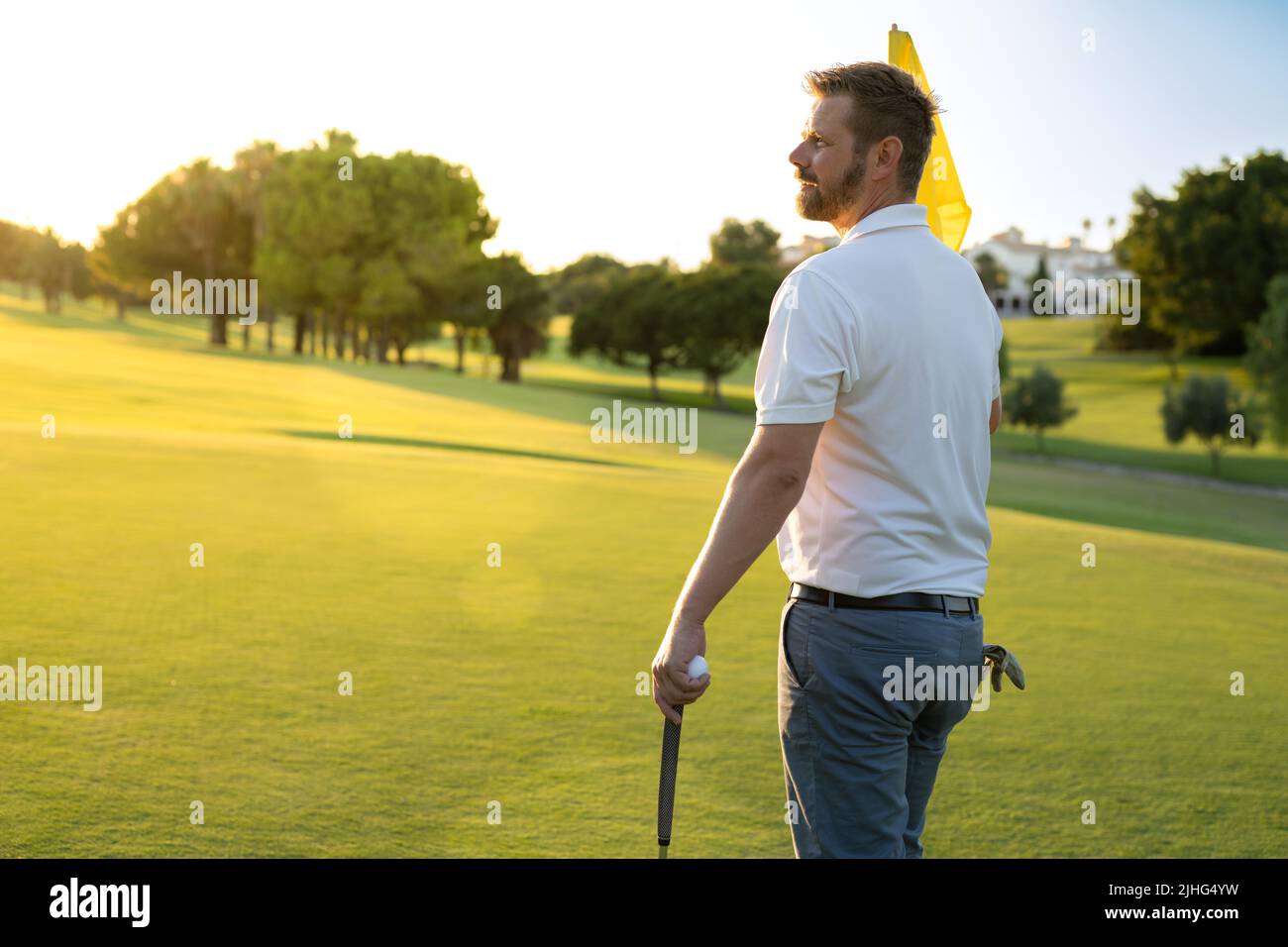 Side view of a professional golf player at golf club Stock Photo - Alamy