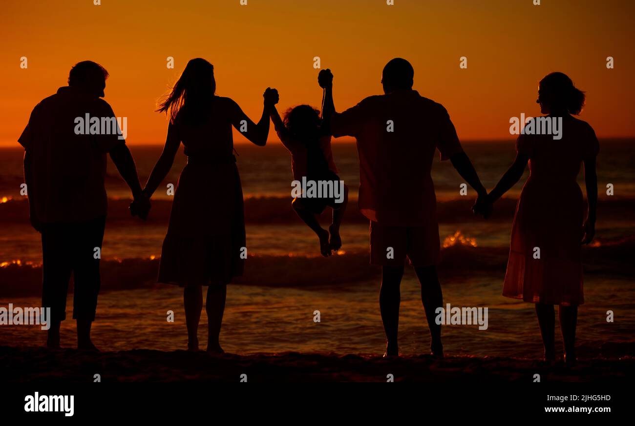 Three generation family beach sunset hi-res stock photography and ...