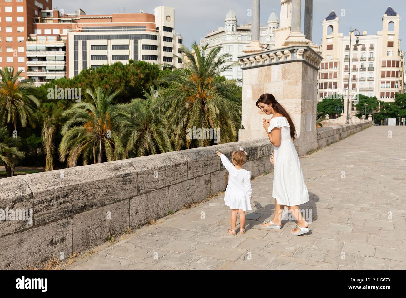Child pointing at trees hi-res stock photography and images - Alamy