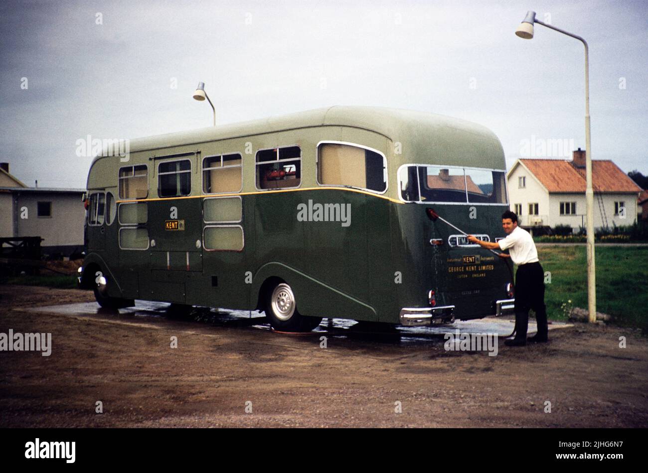 Driver cleaning George Kent Ltd of Luton, England, mobile display unit ...