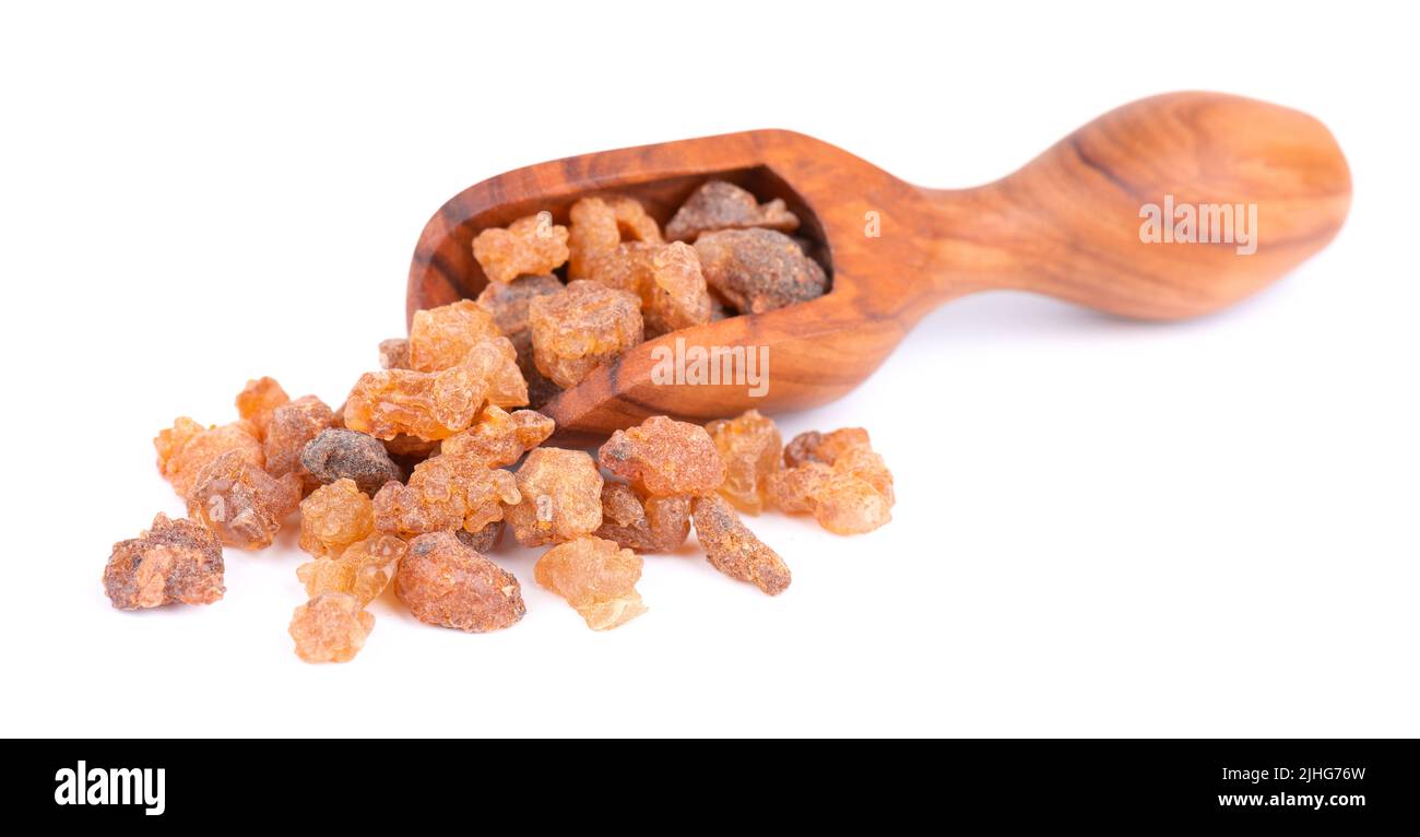 Myrrh resin in olive scoop, isolated on white background. Pile of ...