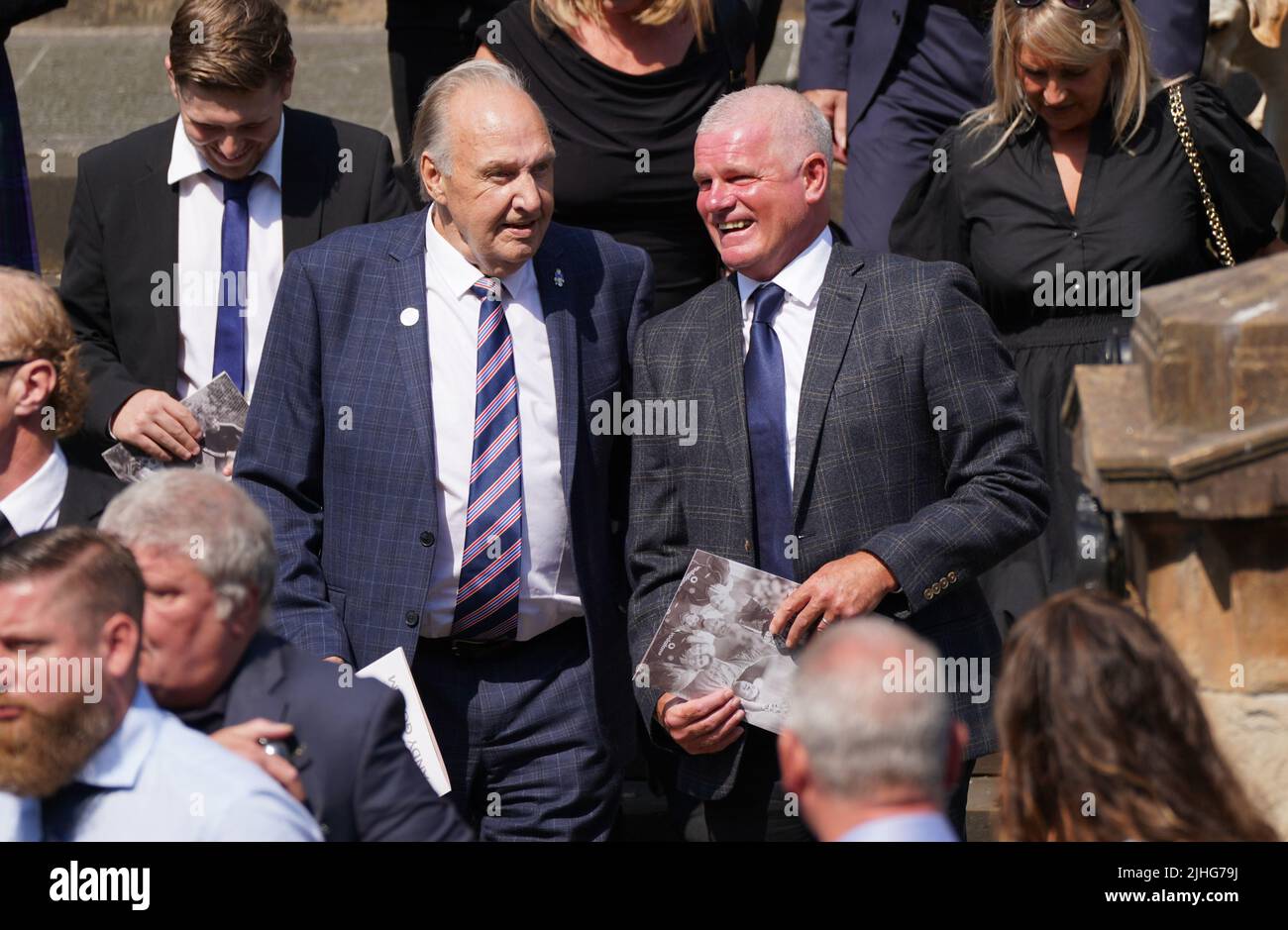 Former Rangers player Ian Durrant (right) leaves the church after the ...