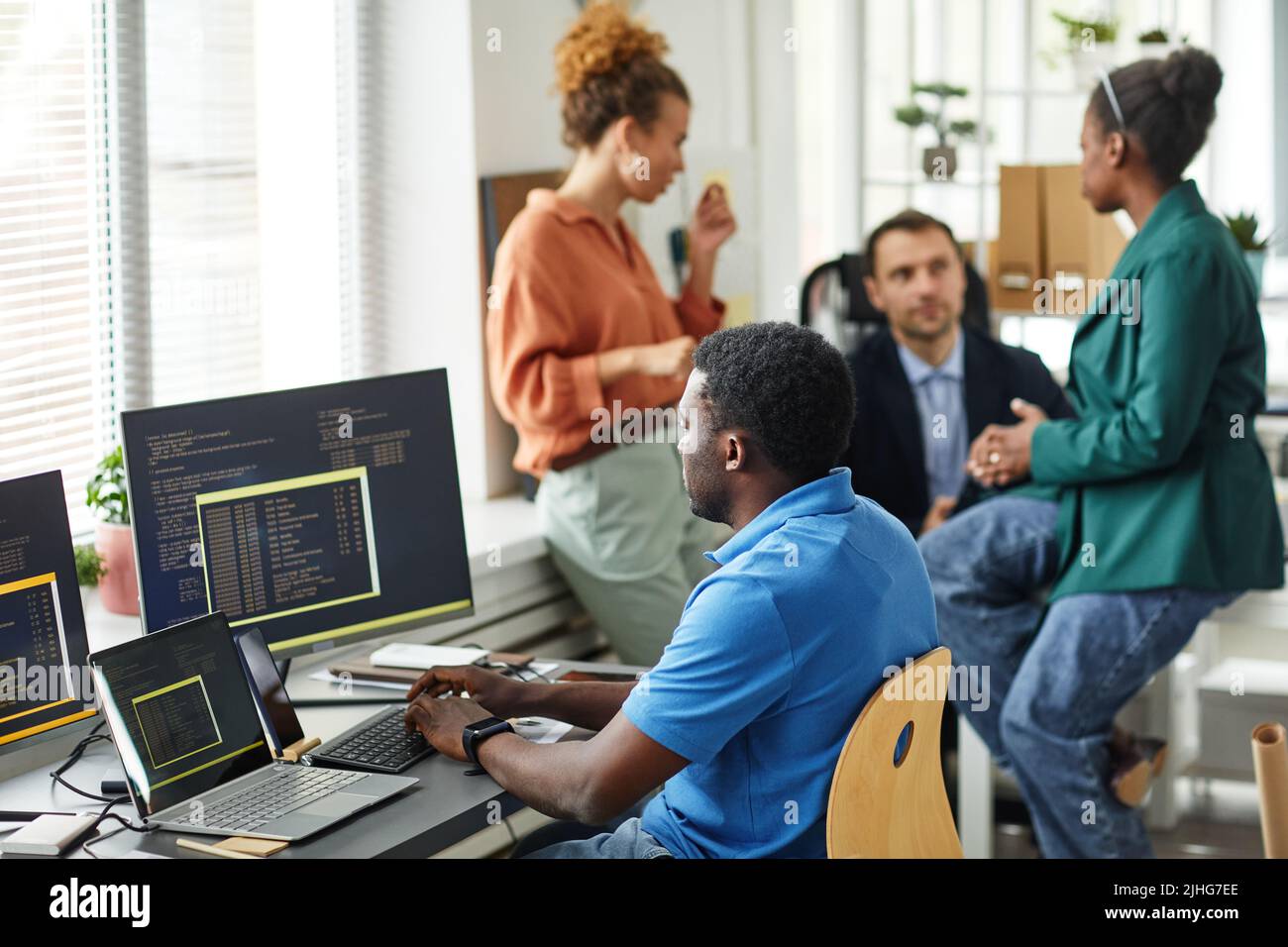 Black specialist working in cyberspace hi-res stock photography and images - Alamy
