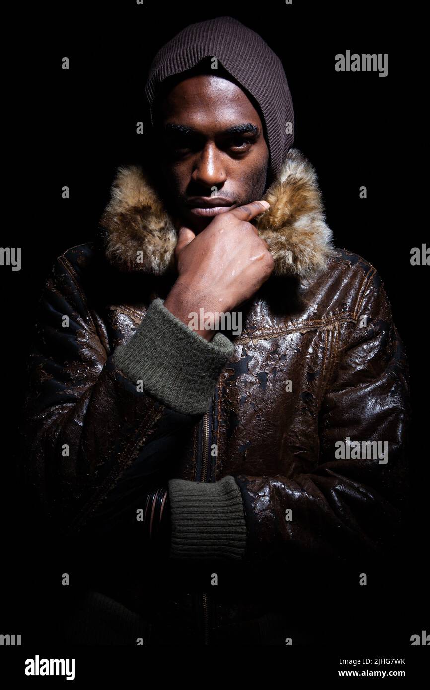 Urban male. A portrait of a confident young black male model emerging ...