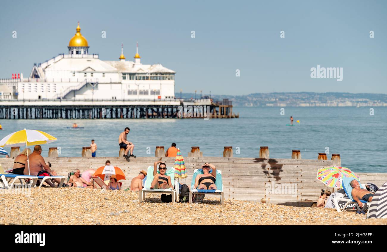 Eastbourne, East Sussex, UK, 18/07/2022, UK Weather, People sunbath on ...