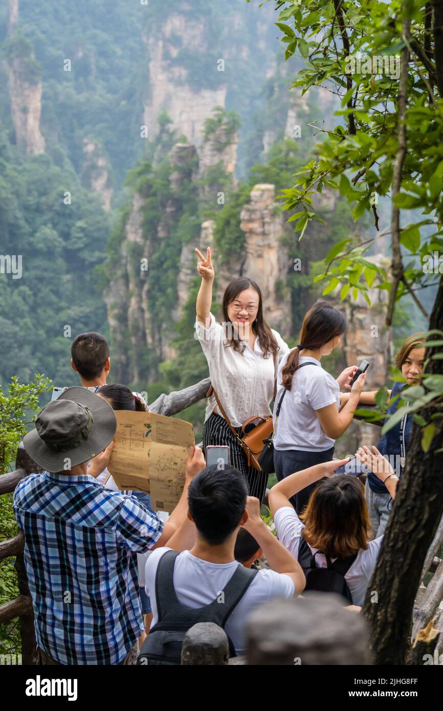 Zhangjiajie, China - August 2019 : Female chinese tourist posing for ...