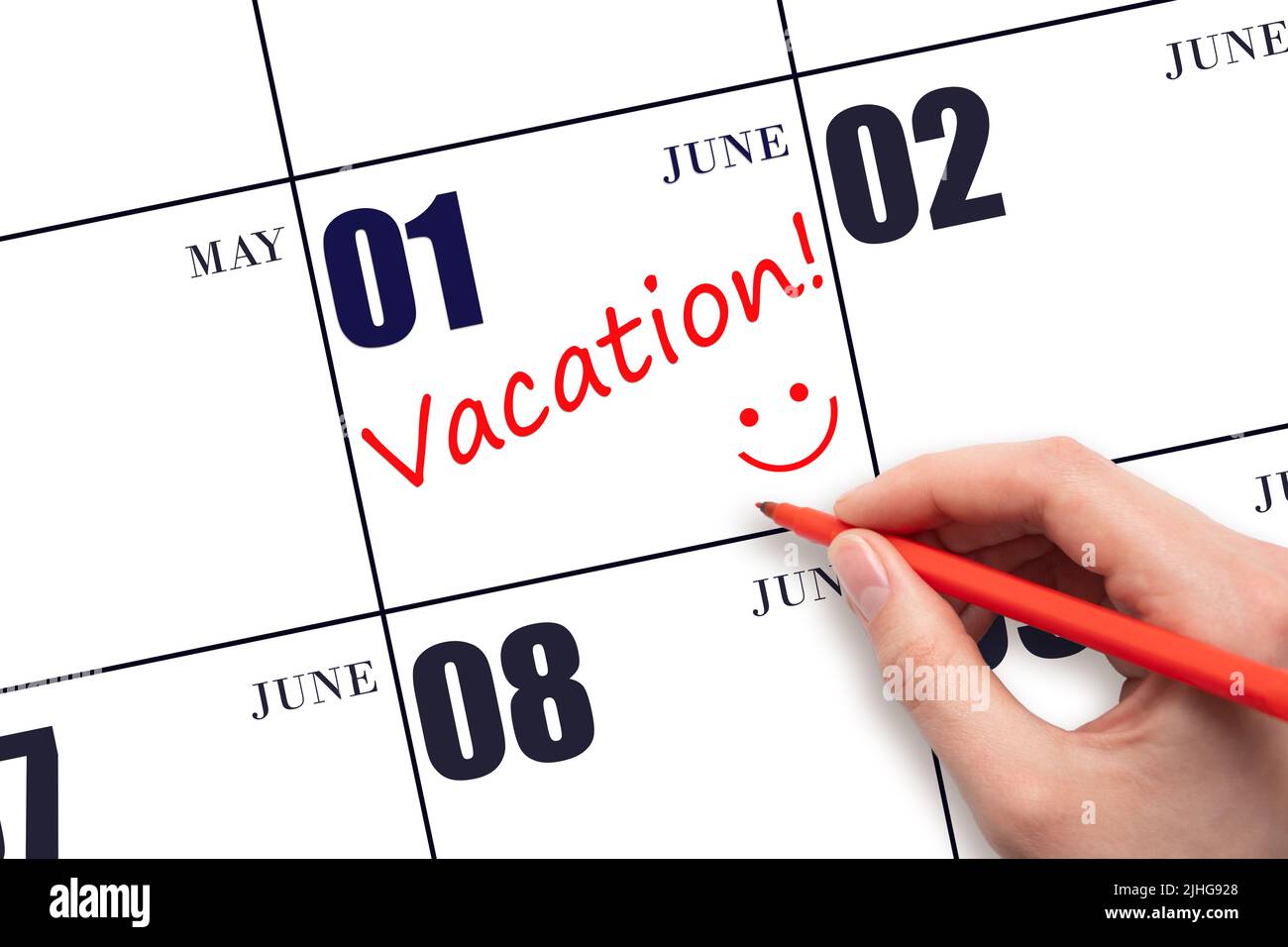 1st day of June. A hand writing a VACATION text and drawing a smiling ...