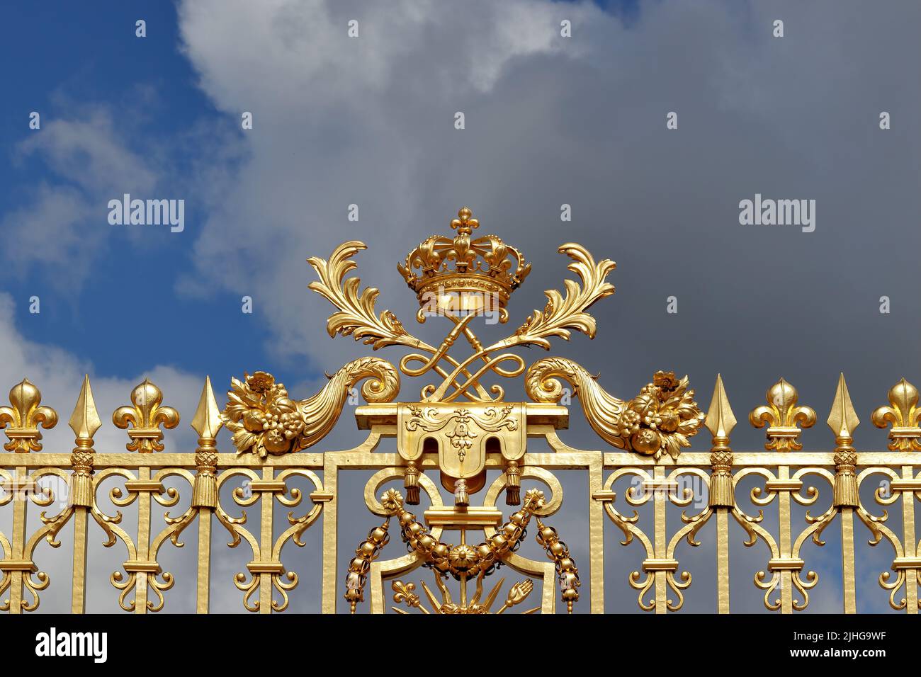 Elements of golden gates decorations at Versailles in Paris, France ...