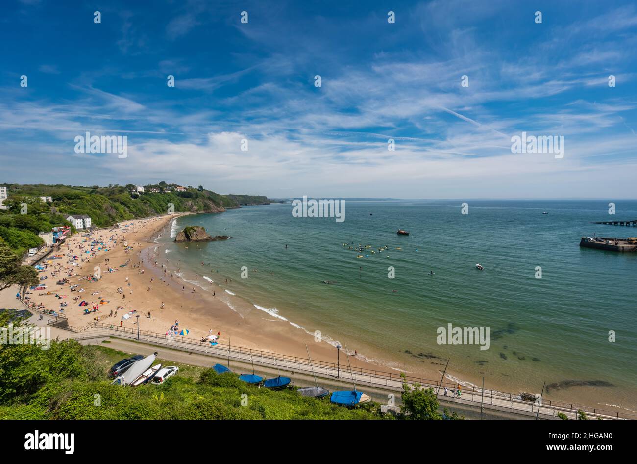 Tenby, Wales - May 2021 : People enjoying sunshine hot day on the ...