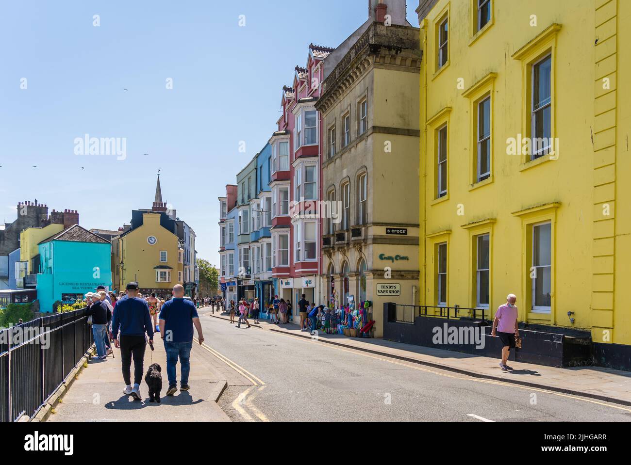 Tenby, Wales - May 2021 : People walking on the streets among the ...