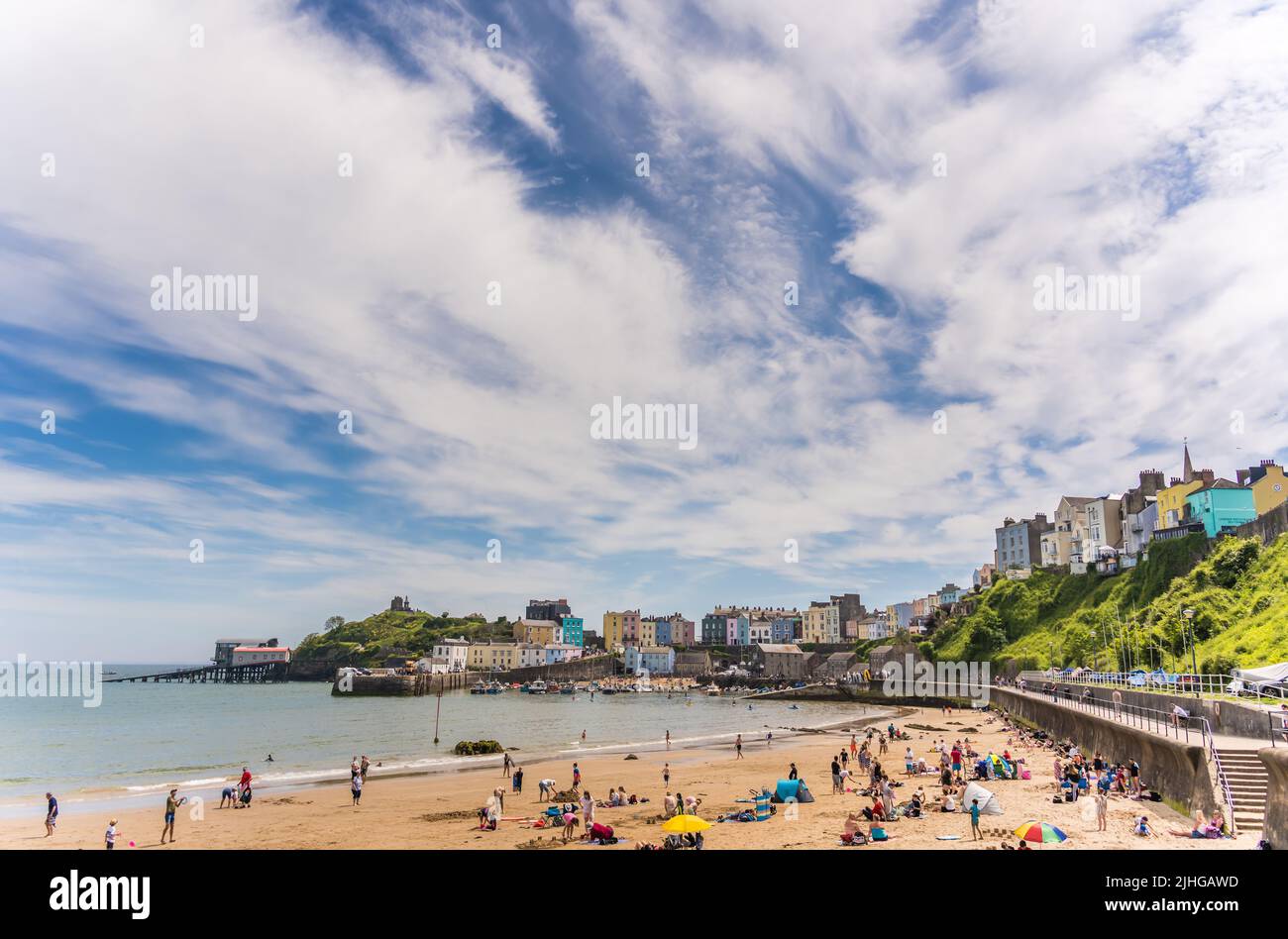 Tenby, Wales - May 2021 : People enjoying sunshine hot day on the ...