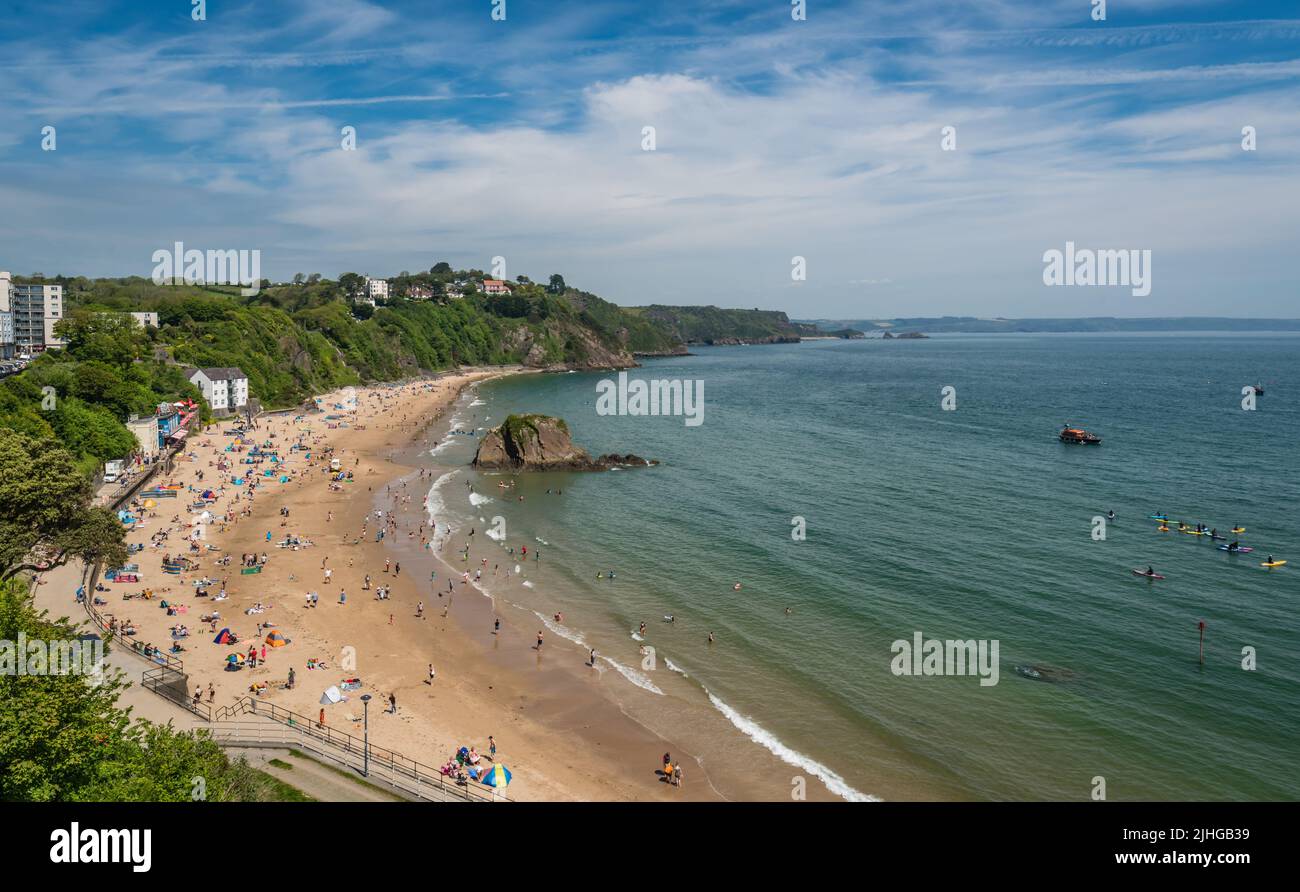 Tenby, Wales - May 2021 : People enjoying sunshine hot day on the ...
