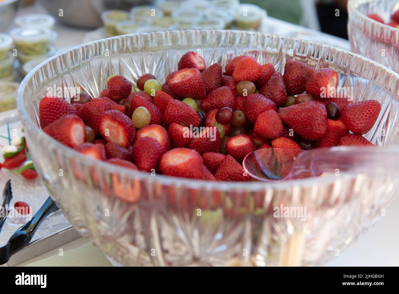 Delicious serve yourself offering of strawberries in a bowl for all the ...