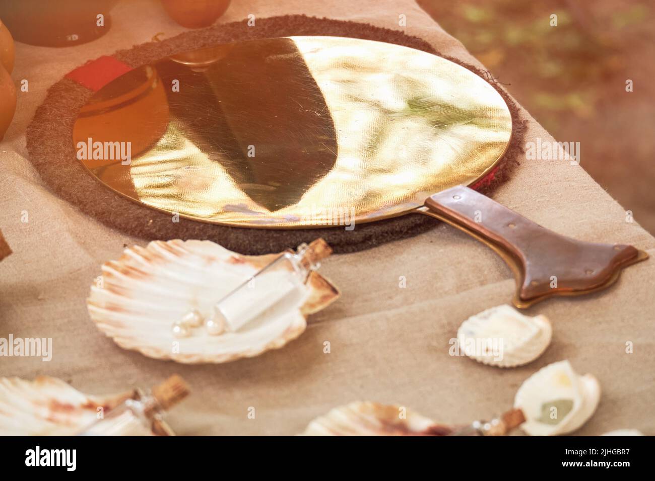 Ancient Roman mirror, retro perfume and vintage bath accessories ...