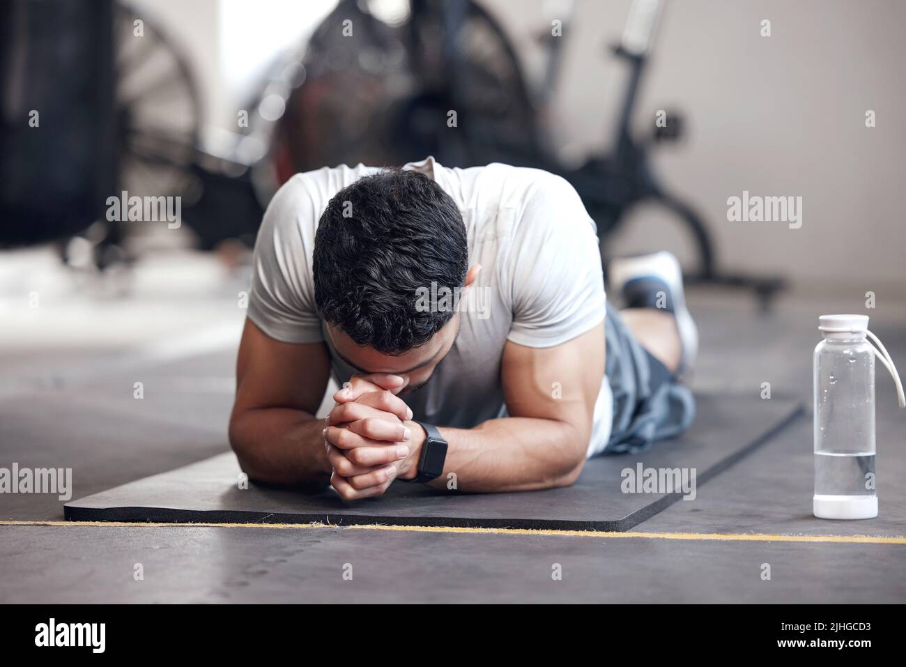 Tired young hispanic man in hi-res stock photography and images - Alamy