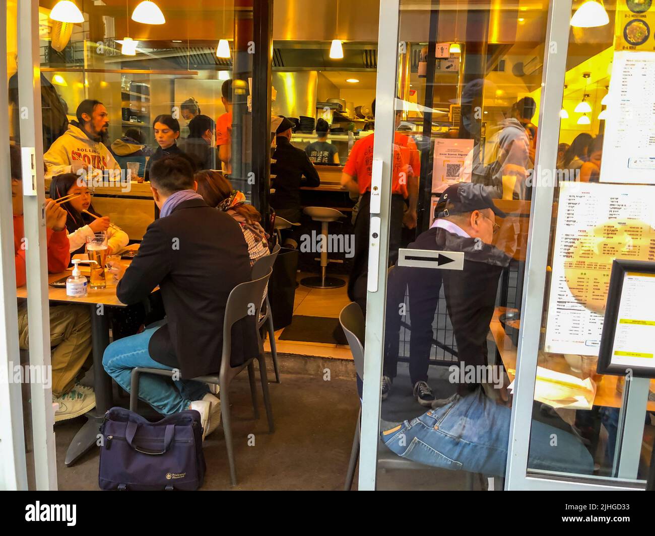 Paris, France, Crowd People sharing meals, Tables, Modern Japanese ...