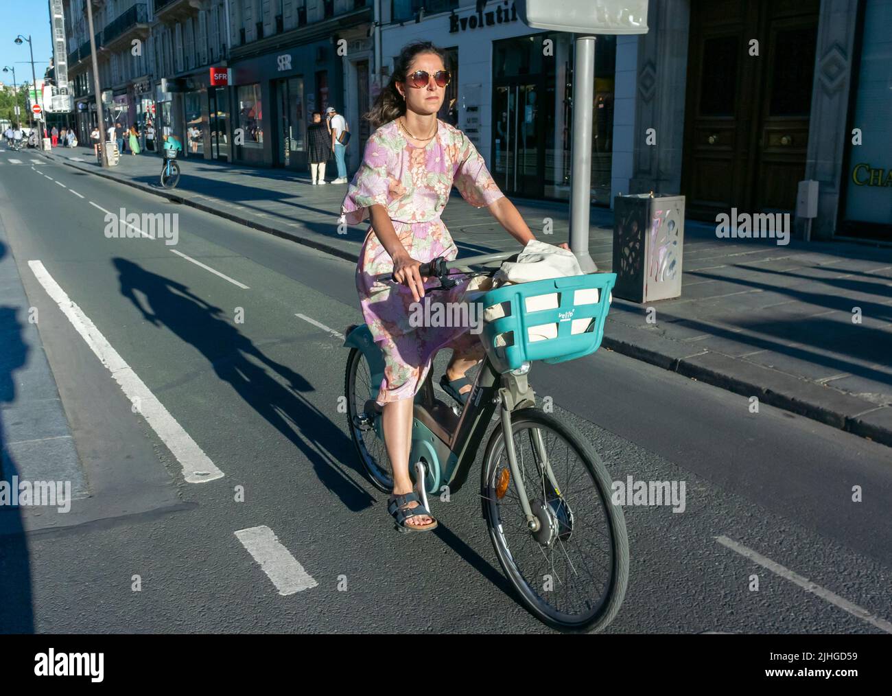 Paris, France, French Woman in Summer Dress Riding Velib, Public ...