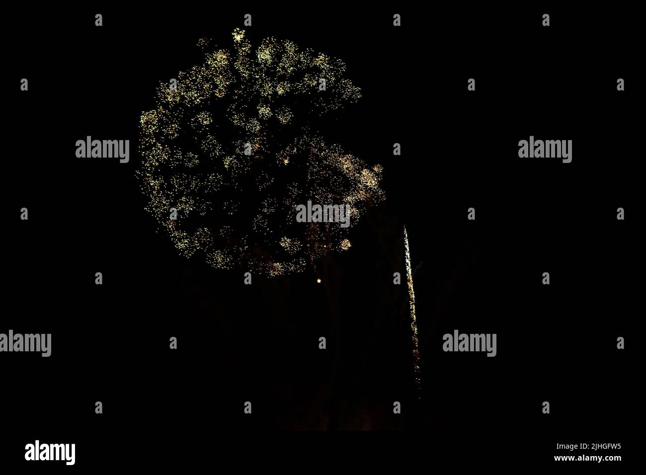 Loud fireworks exploding against black background, can be used as an ...