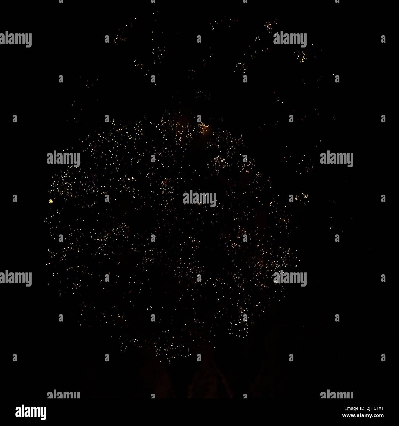 Loud fireworks exploding against black background, can be used as an ...