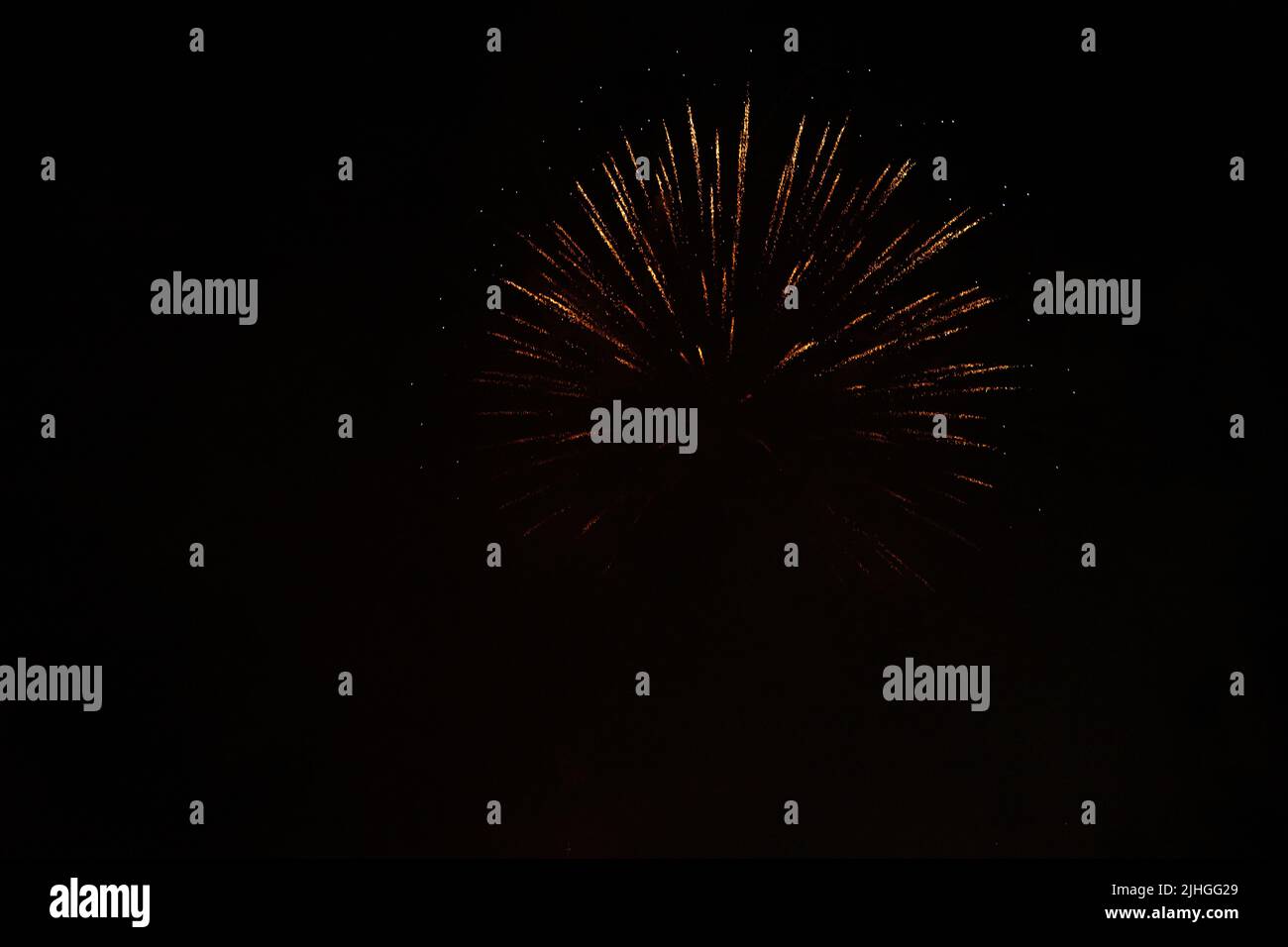 Loud fireworks exploding against black background, can be used as an ...