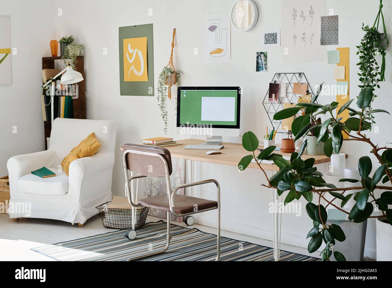 Part of living room with workplace of freelance webdesigner or other ...