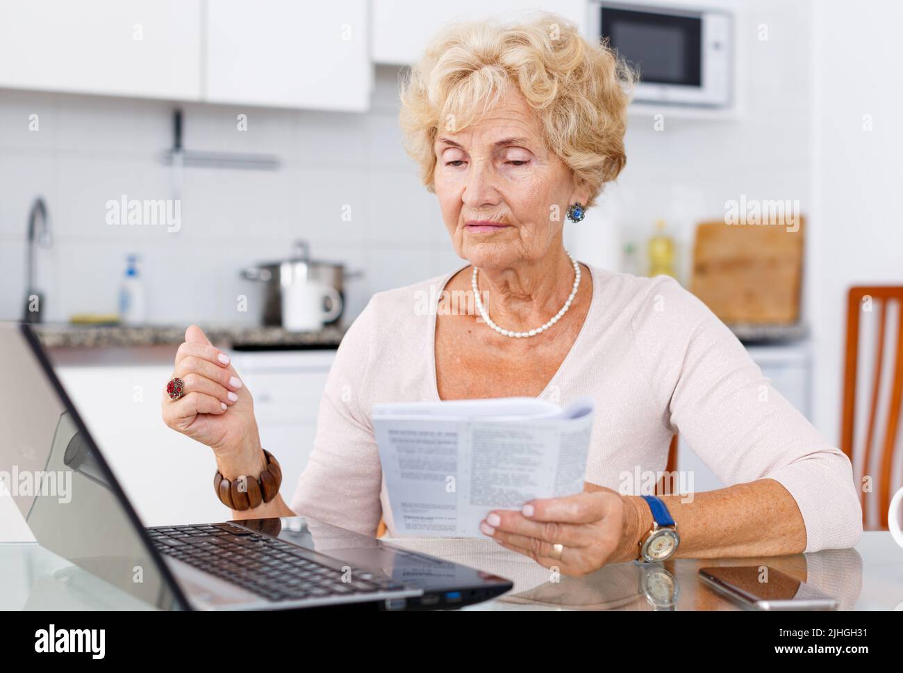 Woman searching on internet Stock Photo - Alamy