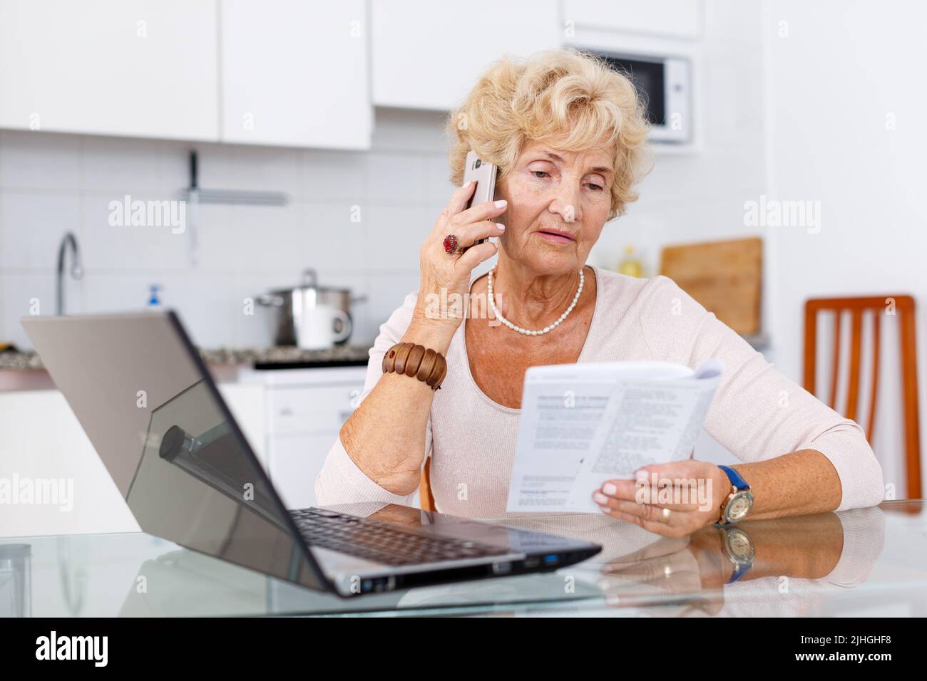 Woman looking at directory hi-res stock photography and images - Alamy