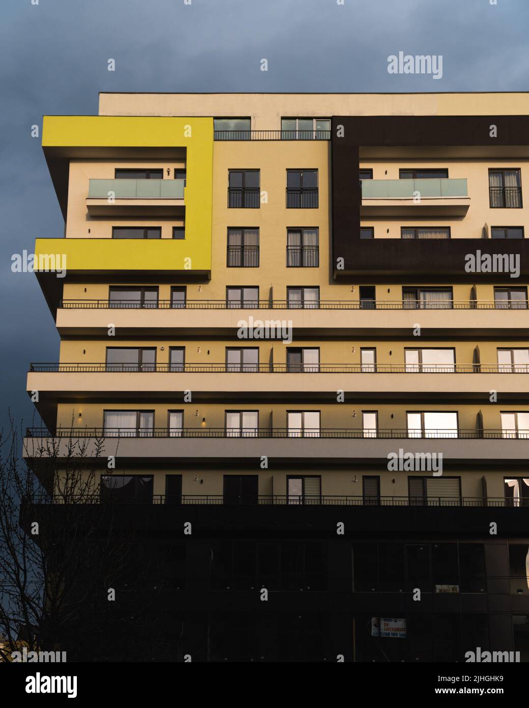 An apartment building during sunset Stock Photo - Alamy