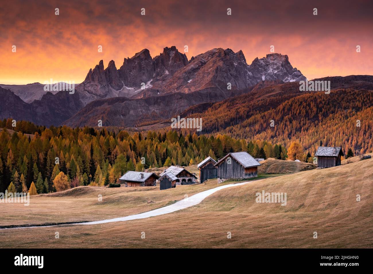 Incredible red sunset at Fuchiade valley in Italian Dolomites ...
