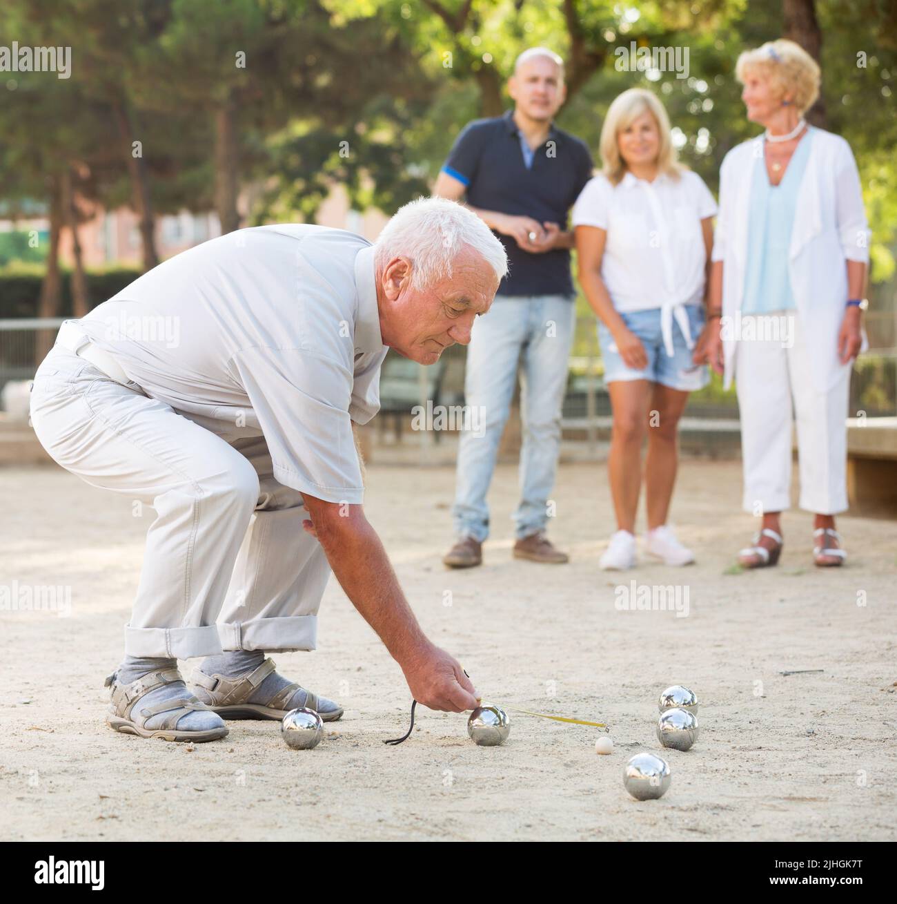 Mature people playing bocce Stock Photo - Alamy