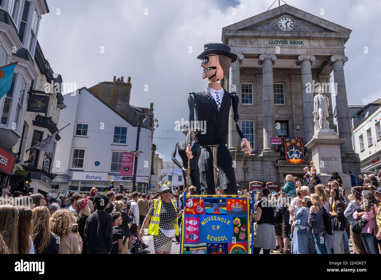 People carrying large withy and paper figures of Rude Boys Figures in ...