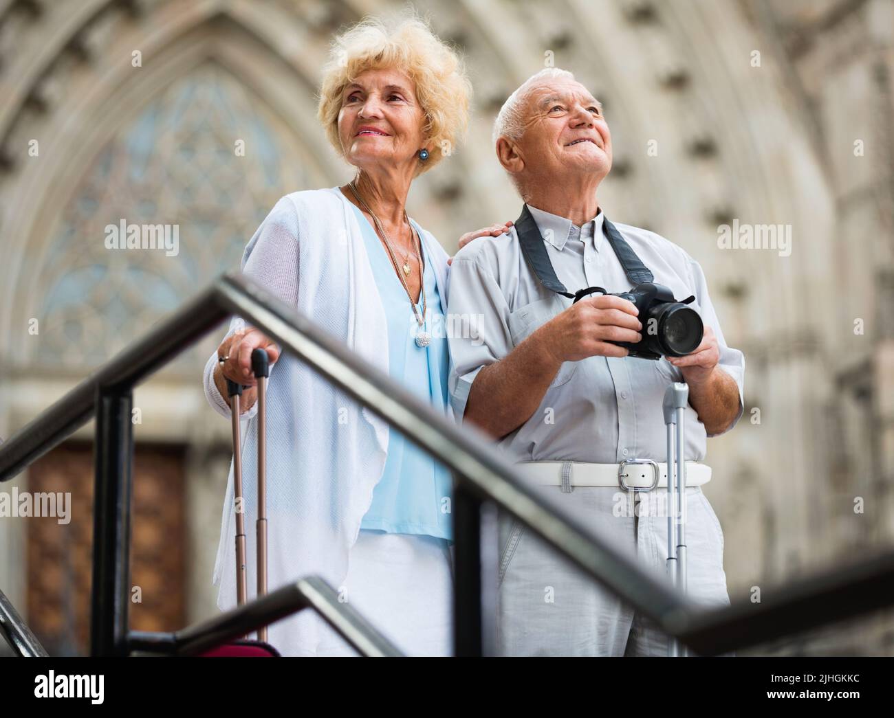 Couple admiring city sights during joint vacation, making photo with ...