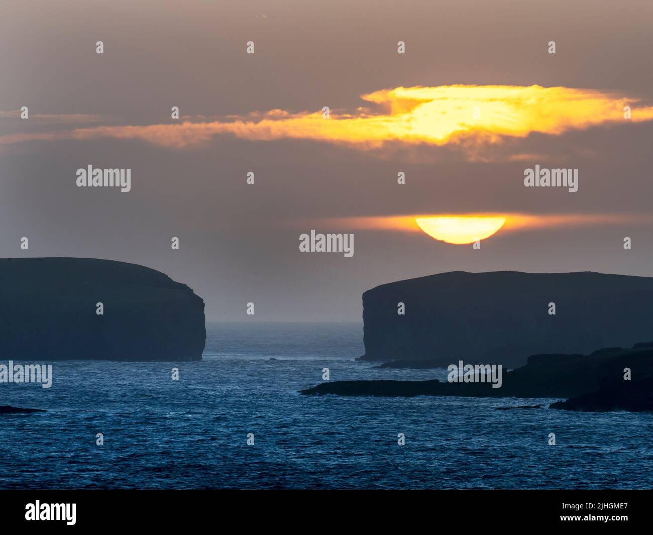 Sunset over Fogla Skerry off Papa Stour in the Shetland Islands from ...