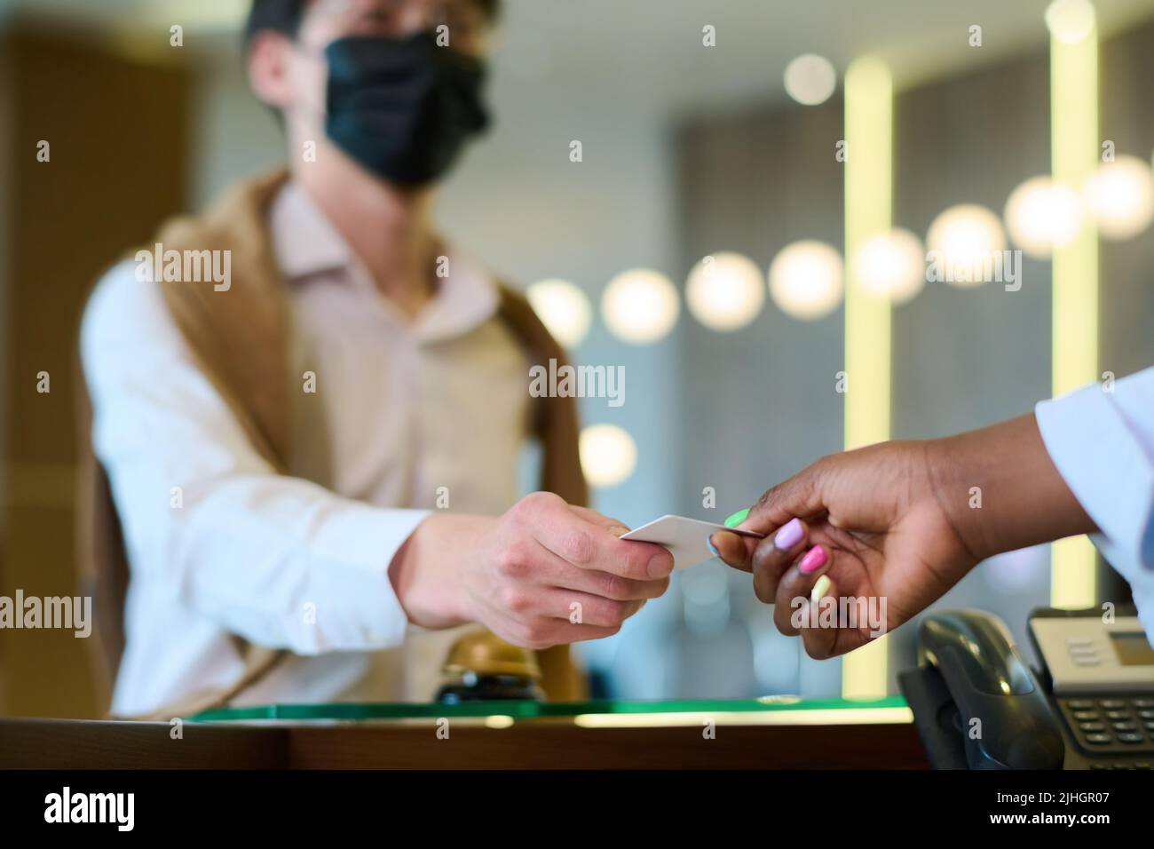 Woman guest counter hi-res stock photography and images - Alamy