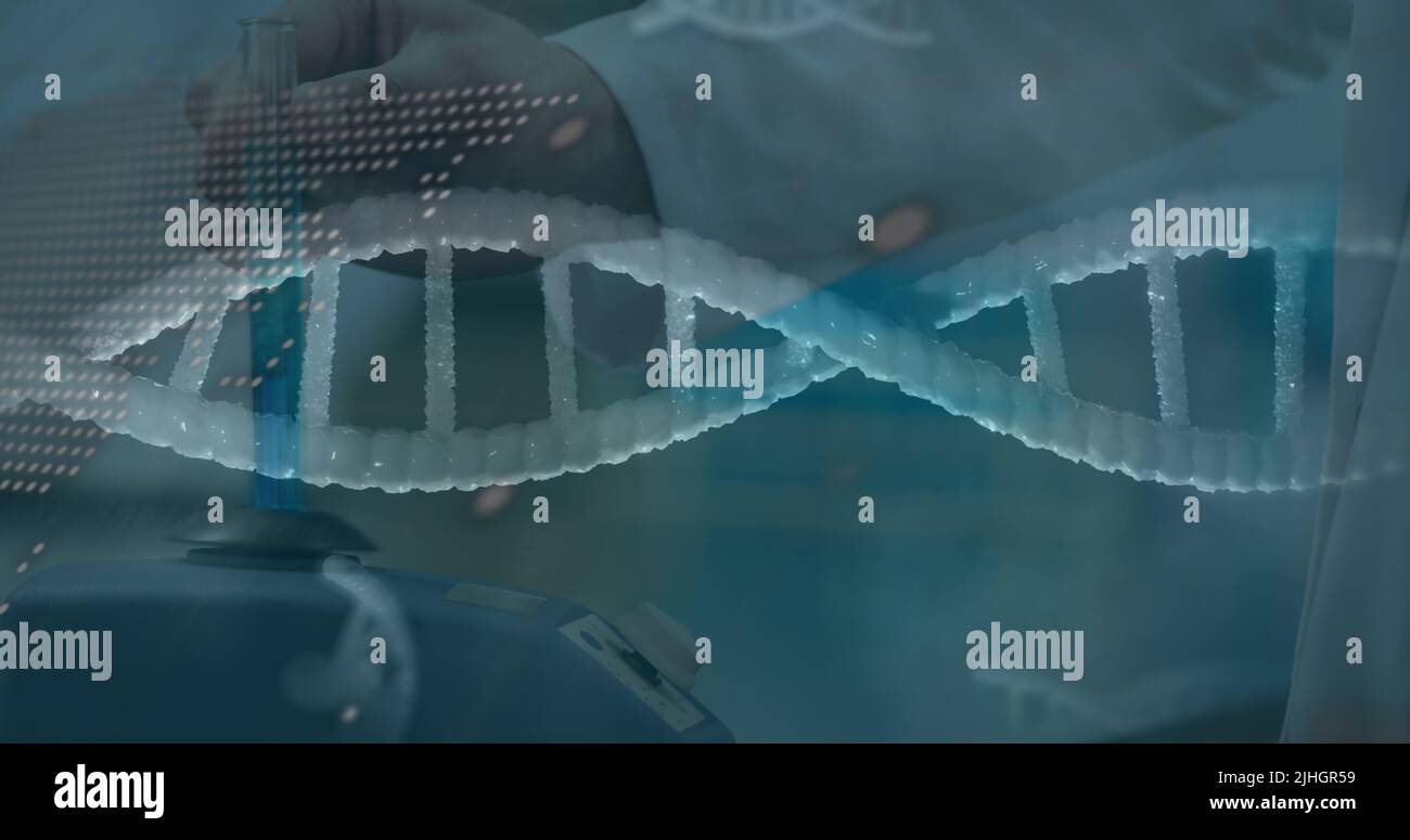 Image of spinning dna strand an data processing over caucasian ...
