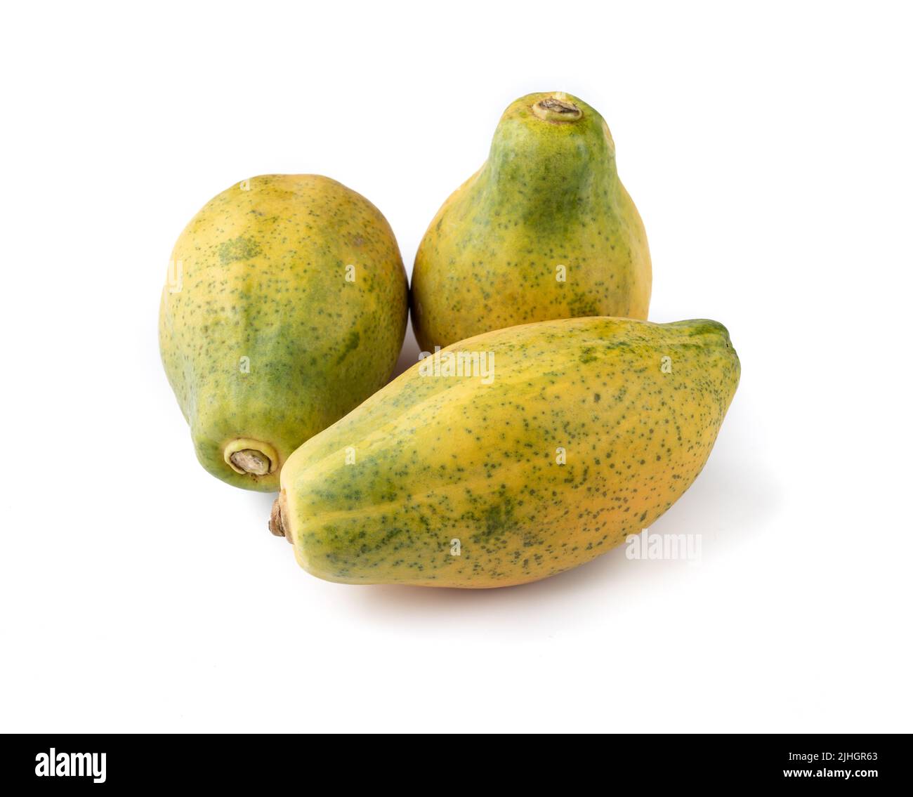 A group of papayas isolated over white background Stock Photo - Alamy