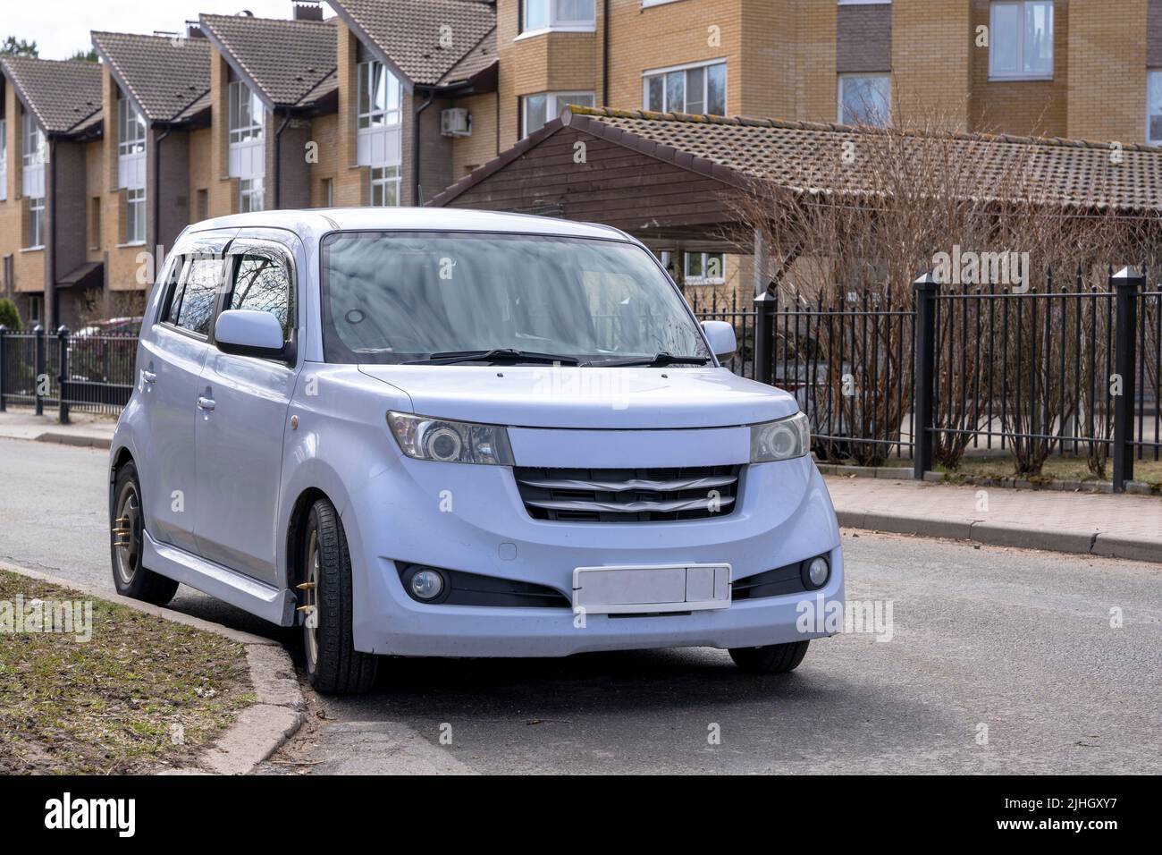 small Japanese right-hand drive car parked in the courtyard Stock Photo ...